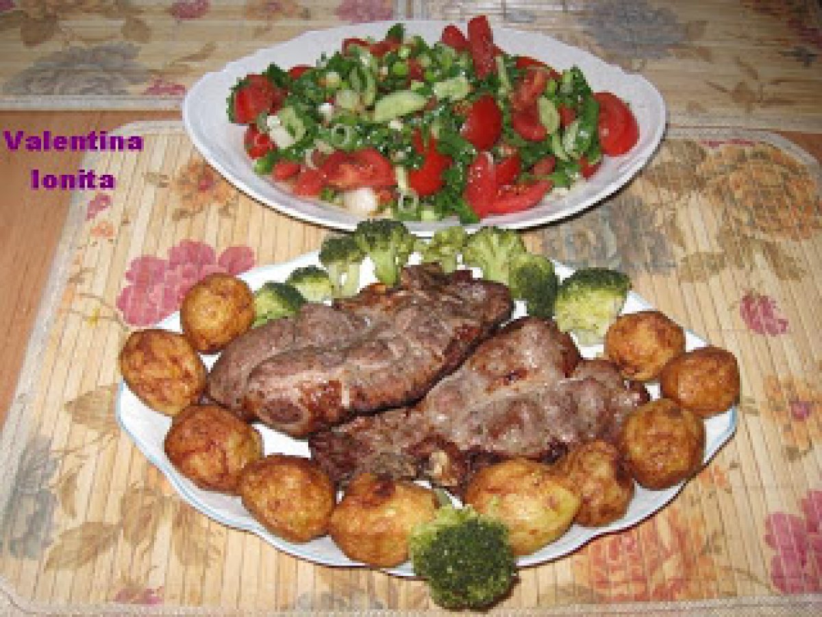 Ceafa de porc marinata la grill (gratar) - Rețetă Petitchef