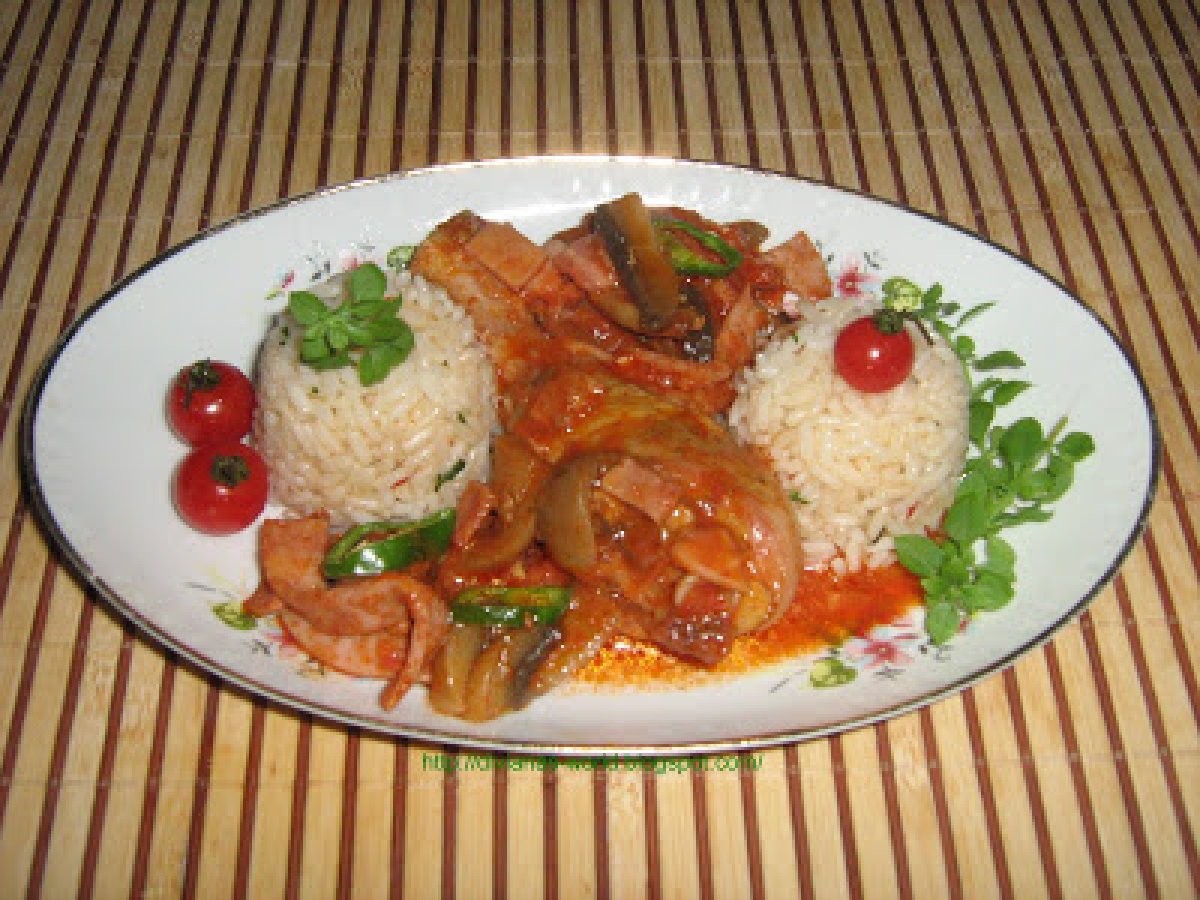 Pulpe de pui in sos picant cu garnitura de orez - Rețetă Petitchef