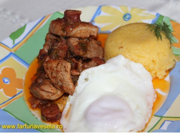 Tochitura de porc (reteta video) - Rețetă Petitchef